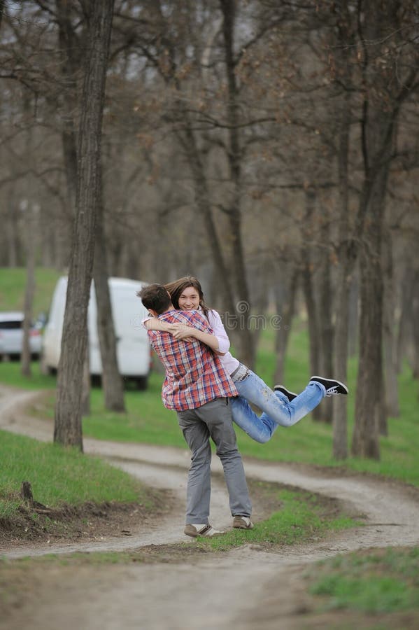 Young Couple Spinning Outside Stock Photo - Image of human ...