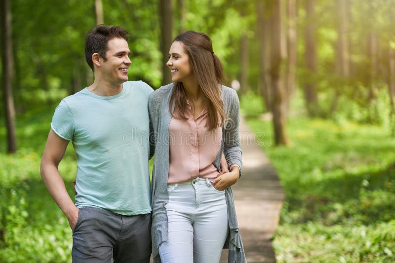 Young Couple Strolling in the Park Stock Image - Image of leisure, park ...