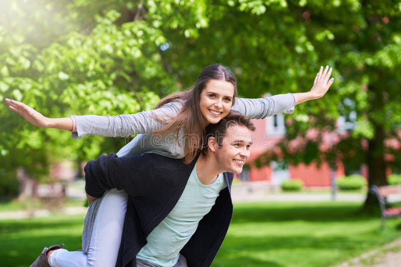 Young Couple Strolling in the Park Stock Image - Image of enjoying ...