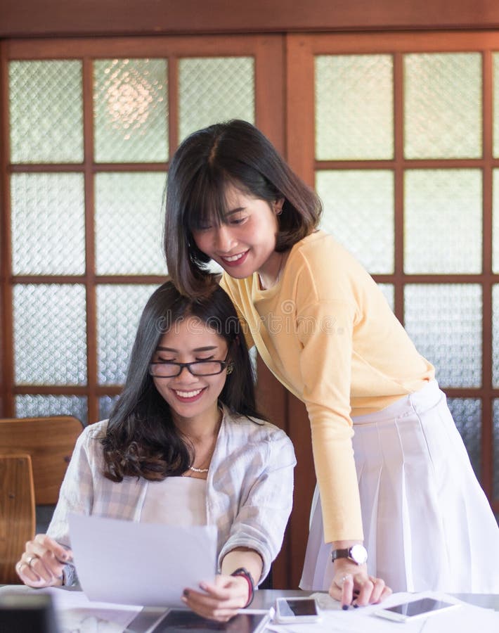 Young Couple Student Discussing Things and Working on a Project Stock ...