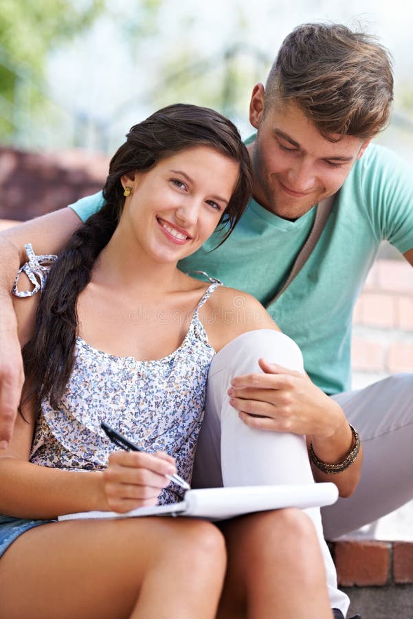 Preparing for the Test. a Young Couple Studying Together on the Steps ...