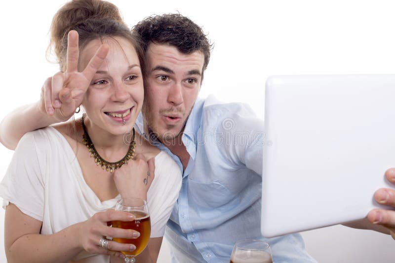 Young Couple Taking a Picture with a Tablet Computer Stock Image ...
