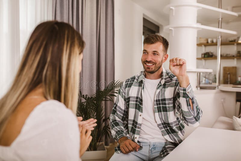 Couple Talking Using Sign Language at Home Stock Photo - Image of ...