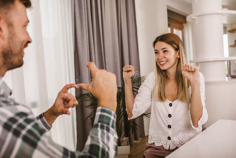 Couple Talking Using Sign Language at Home Stock Image - Image of ...