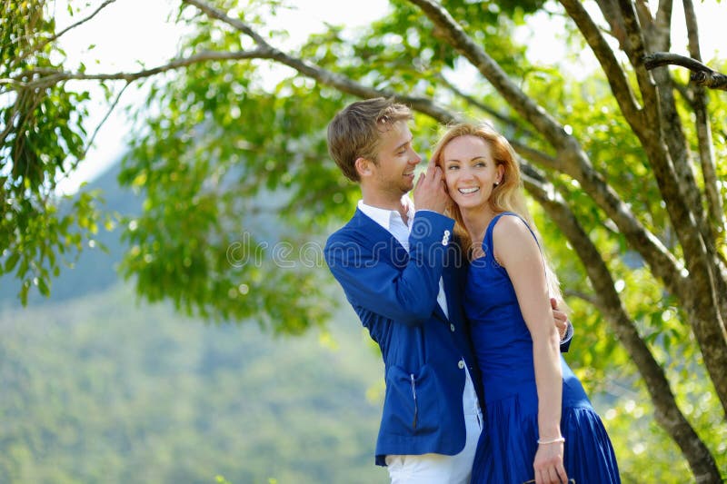 Young Couple on a Tropical Island Stock Image - Image of outdoor, grass ...