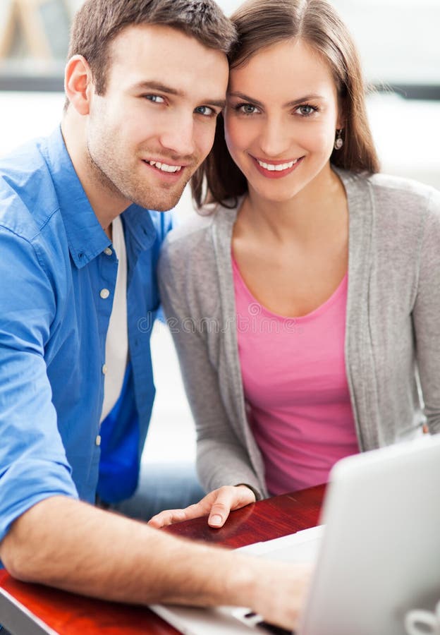 Young couple with laptop stock image. Image of caucasian - 29933917