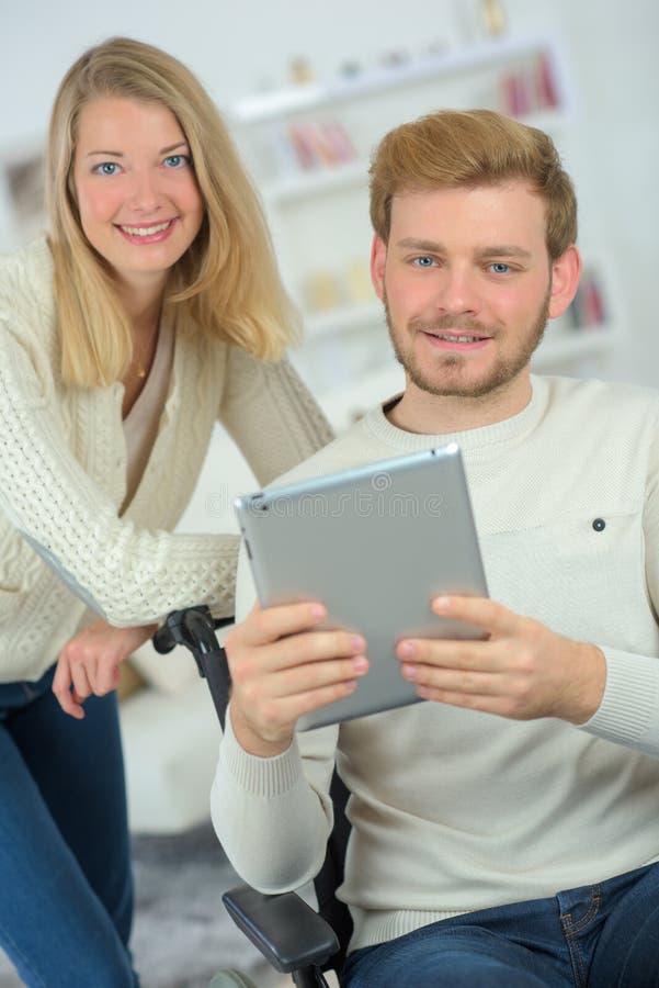 Young Couple Using Their Tablet Computer Stock Image - Image of happy ...