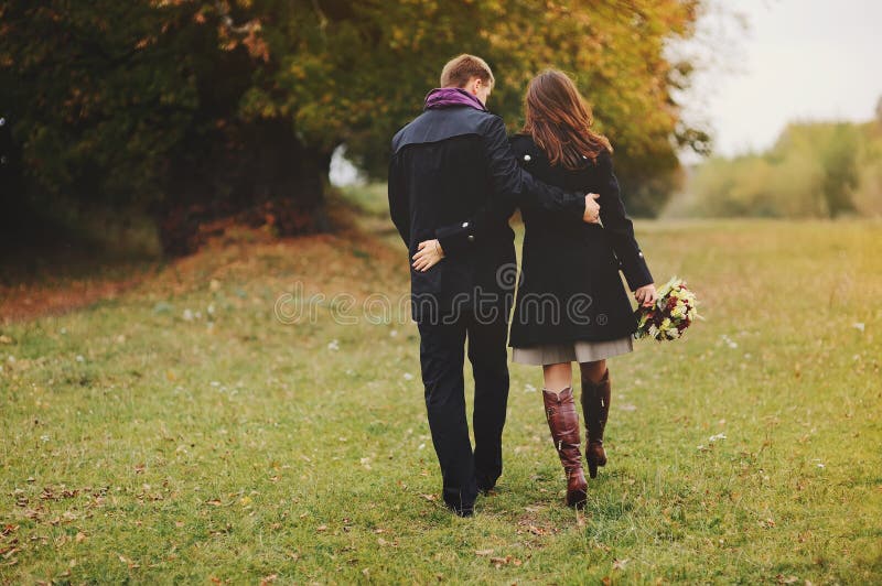 Young couple walking away stock photo. Image of desire - 30163194