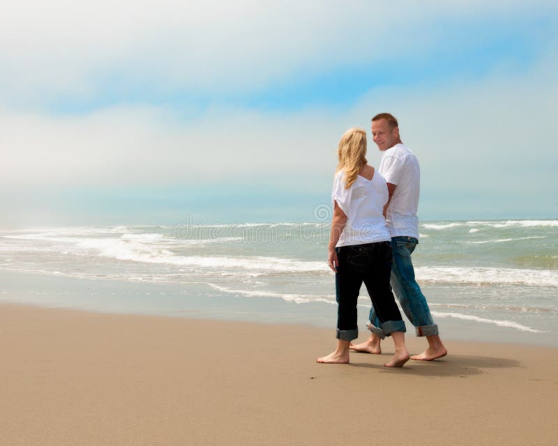 Young Couple Walking Away on the Beach Stock Photo - Image of married ...