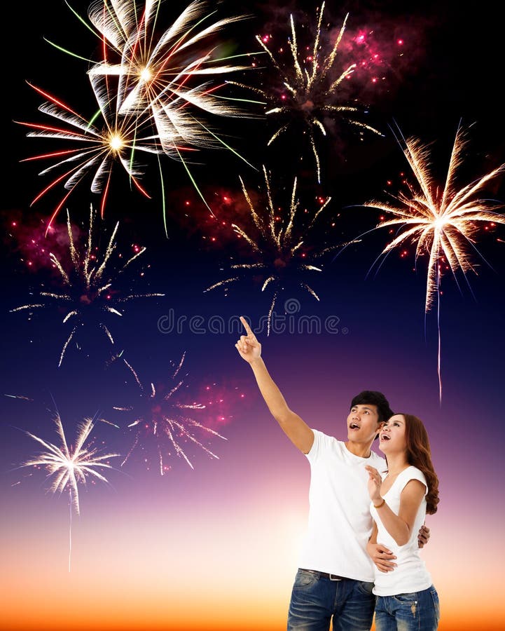 Young Couple Watching the Fireworks Stock Image - Image of fire, season ...