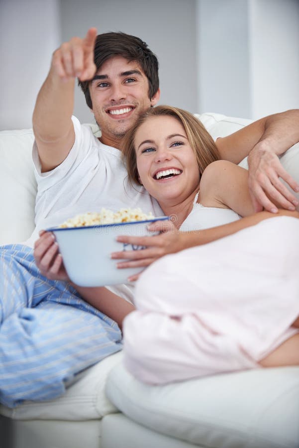 Movie Night. a Young Couple Watching a Movie at Home. Stock Image ...