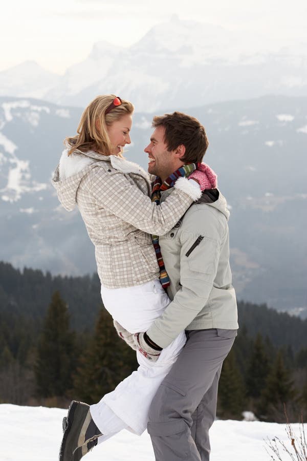 Young Couple on Winter Vacation Stock Image - Image of together, alpine ...