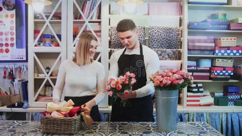 Young Couple Work at Flower Shop. Stock Photo - Image of blossom ...