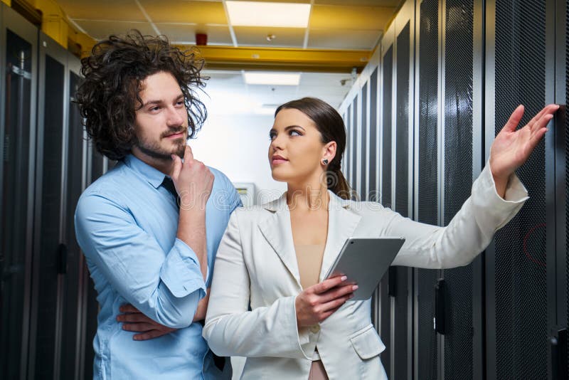 Young Couple Working at a Data Center Stock Photo - Image of cheerful ...