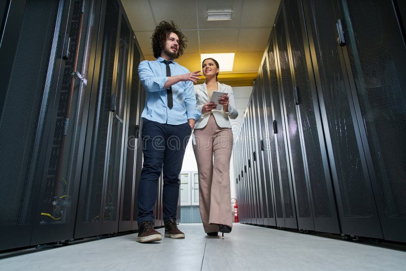 Young Couple Working at a Data Center Stock Image - Image of computing ...