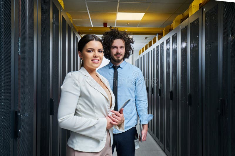 Young Couple Working at a Data Center Stock Image - Image of cables ...