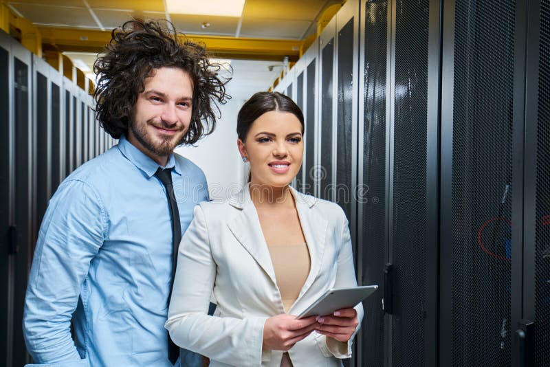 Young Couple Working at a Data Center Stock Image - Image of checking ...