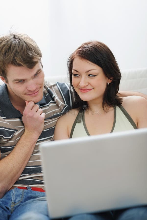 Young Couple Working on Laptop Stock Image - Image of notebook ...