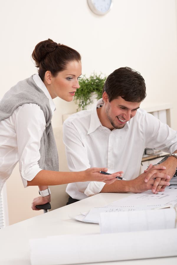 Young Couple Working Together Stock Photo - Image of portrait, success ...