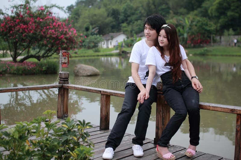 Young couples in the park stock image. Image of park - 24929453