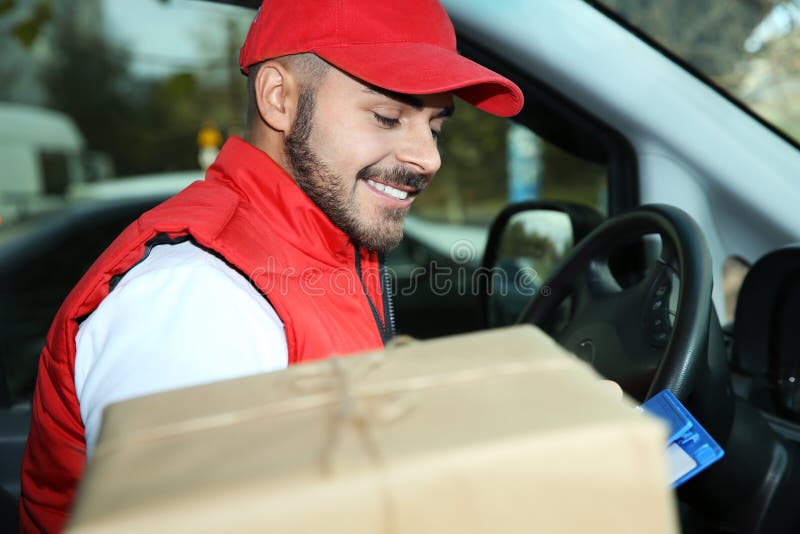 Young Courier Checking Amount of Parcels in Delivery Stock Image ...