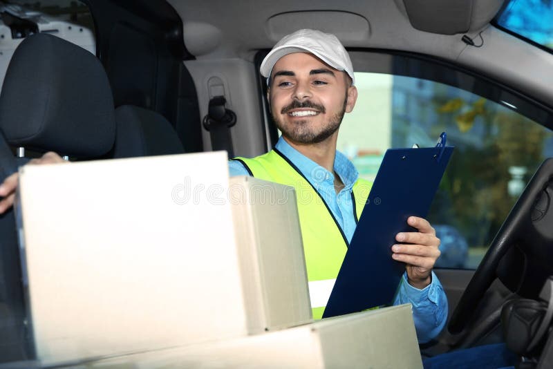 Young Courier Checking Amount of Parcels Stock Image - Image of amount ...