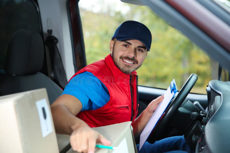 Young Courier Checking Amount of Parcels Stock Photo - Image of ...