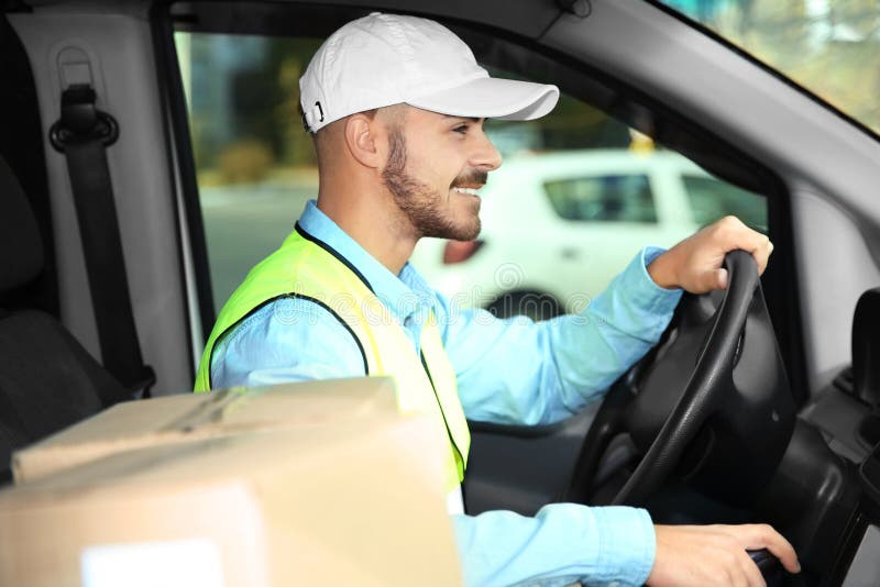 Young Courier Driving Delivery Van Stock Image - Image of freight ...