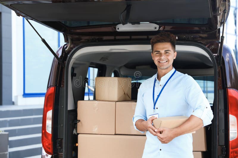 Young Courier with Parcel Near Delivery Car Stock Image - Image of ...