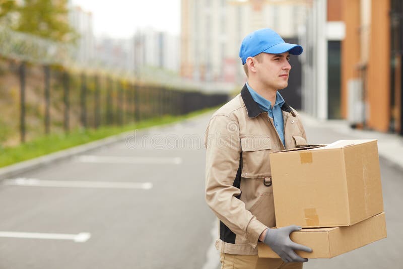 Courier delivering parcels stock image. Image of occupation - 189107313