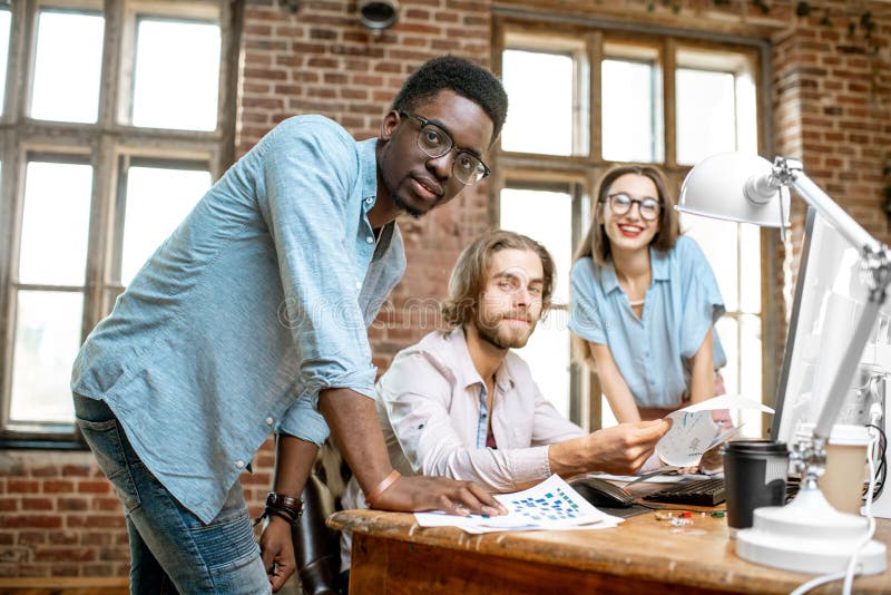 Young Coworkers Working with Computer Indoors Stock Photo - Image of ...