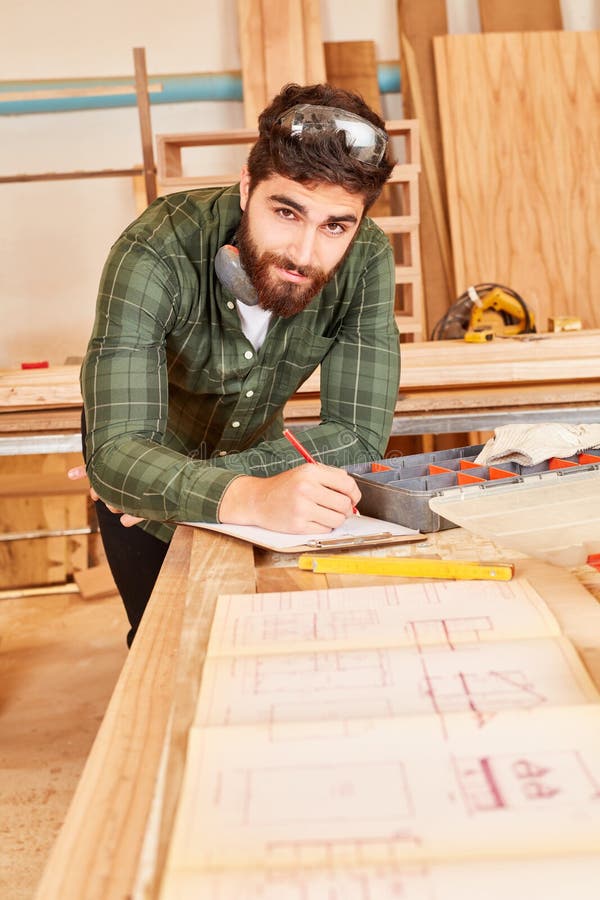Craftsman Drawing and Planning Stock Image - Image of carpenter ...