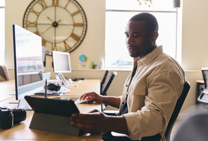 Young Creative Black Man Working on Computer in Modern Office at Desk ...