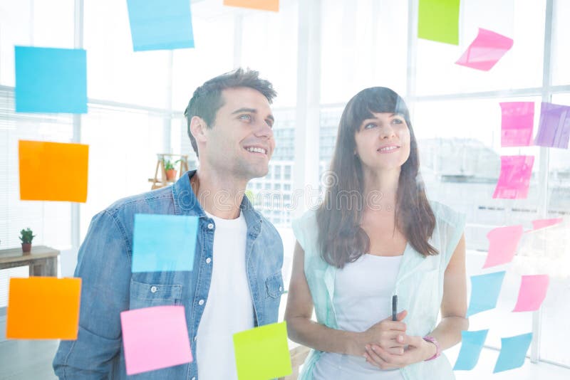 Young Creative Business People Looking at Photo Editor Stock Image ...