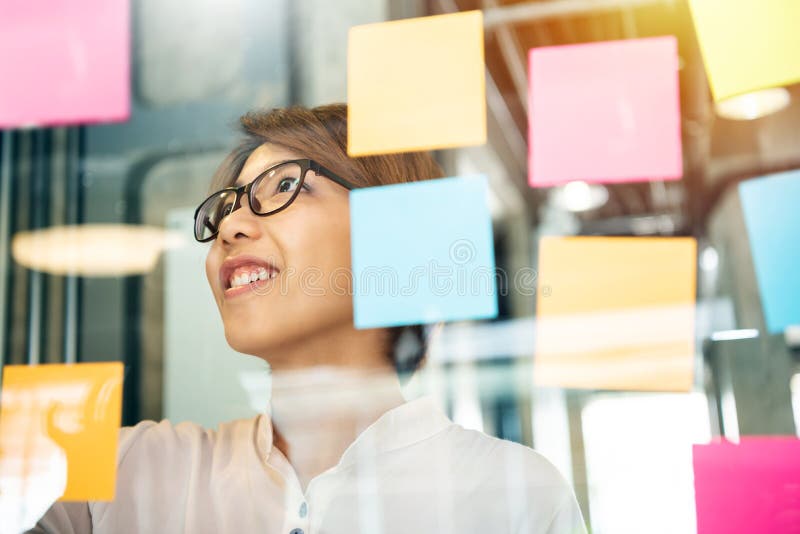 Young Creative Designer Sharing Ideas at Sticky or Post it Notes Stock ...