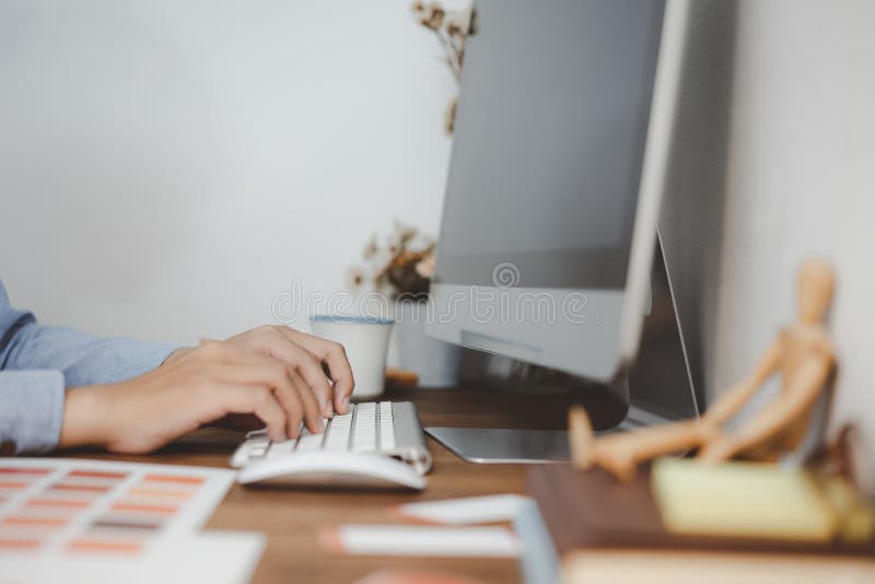 Young Creative Designer Working with Keyboard during Draft Project on a ...