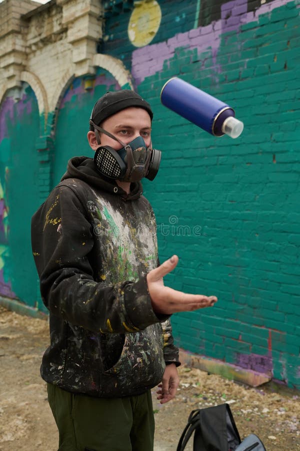 Throwing Blue Can with Graffiti Paint Stock Image - Image of mask ...