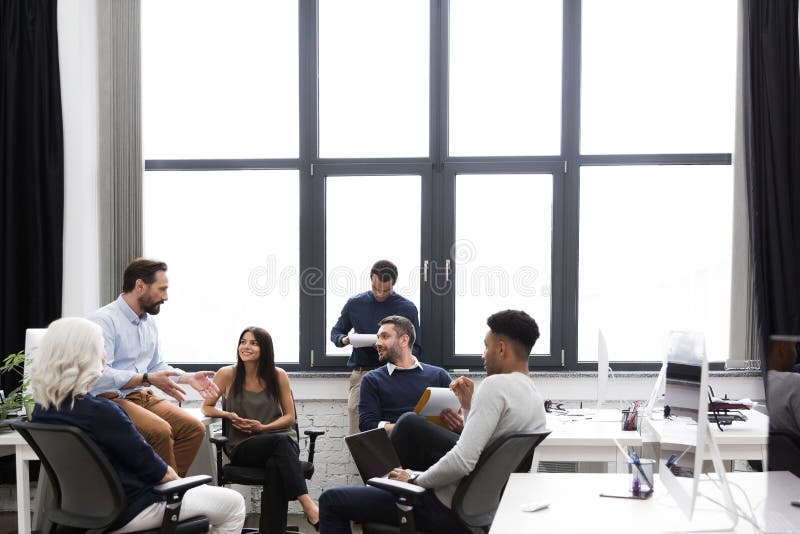 Young Creative People Sitting at the Office Stock Image - Image of ...