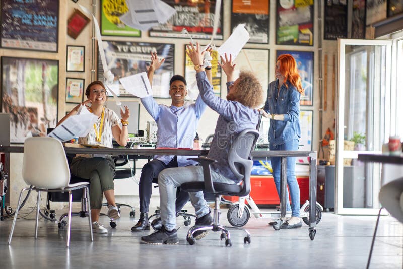 Young Creative People at Work in the Office are Celebrating Finished ...