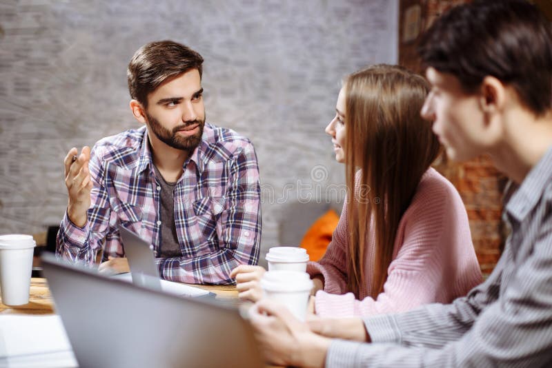 Young Creative People Working on a Business Project Together. Stock ...