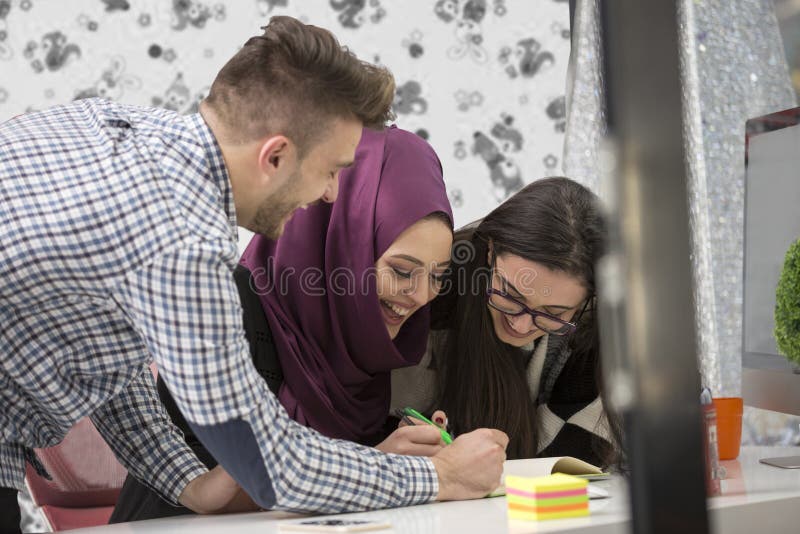 Young Creative Startup Business People on Meeting at Modern Office ...