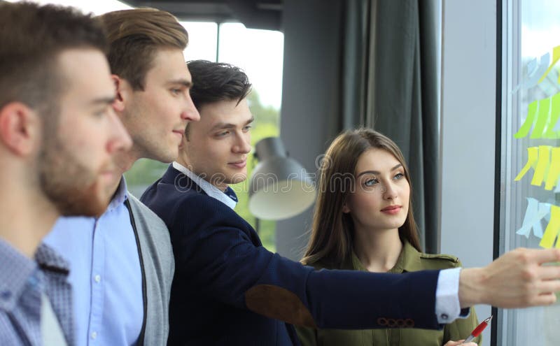 Young Creative Startup People on Meeting at Modern Office Making Plans ...