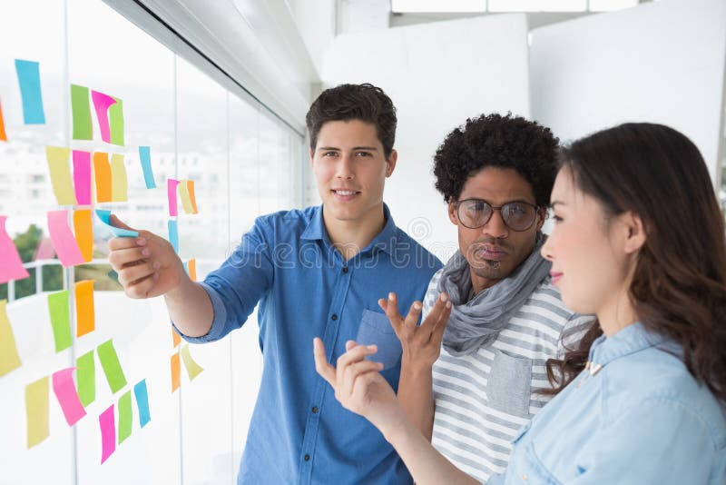 Young Creative Team Brainstorming Together Stock Image - Image of ...