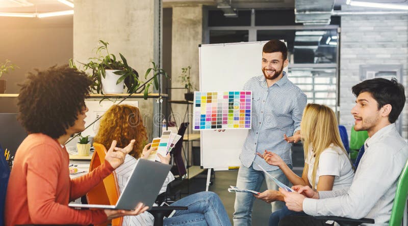 Young Creative Team Choosing Color Design of New Project Stock Photo ...