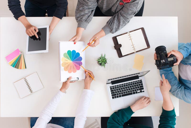 Young Creative Team Having a Meeting in Creative Office - Teamwork ...