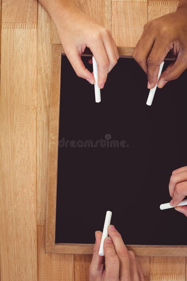 Young Creative Team Using Chalkboard Stock Photo - Image of design ...