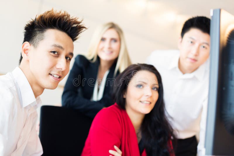 Young Creative Team Working on Their Computer Stock Image - Image of ...