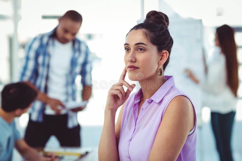 Young Creative Worker Thinking Stock Photo - Image of indoors, partners ...
