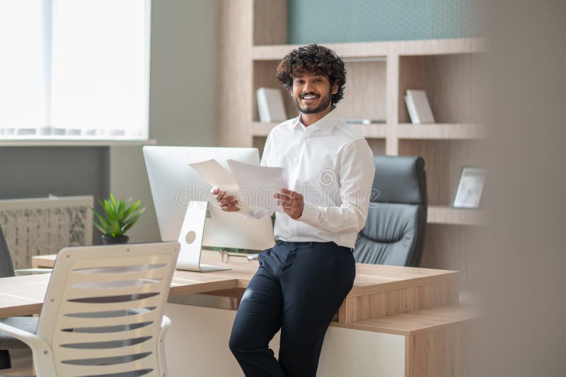 Young Curly-haired Manager Feeling Busy at Work Stock Photo - Image of ...
