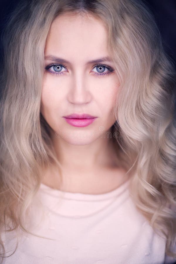 Young curly-headed woman stock image. Image of caucasian - 74912405